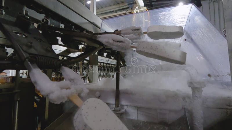 Freezing Ice Cream on the Conveyor Slow Motion. Ice Cream Production ...