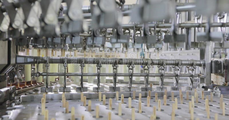 Freezing Ice Cream at the Factory. Automatic Production of Ice Cream ...