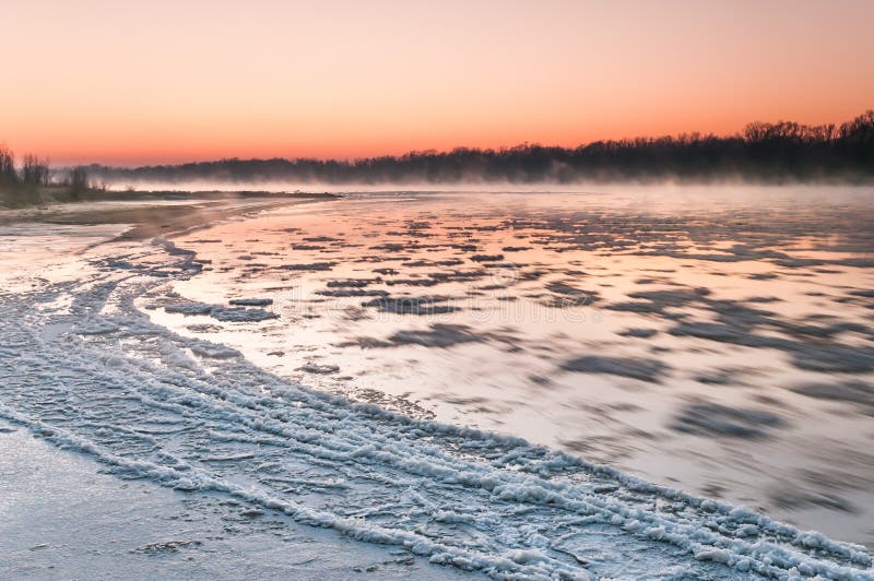Wild Bank of a Freezing River Covered in Fog during Dusk Stock Photo ...