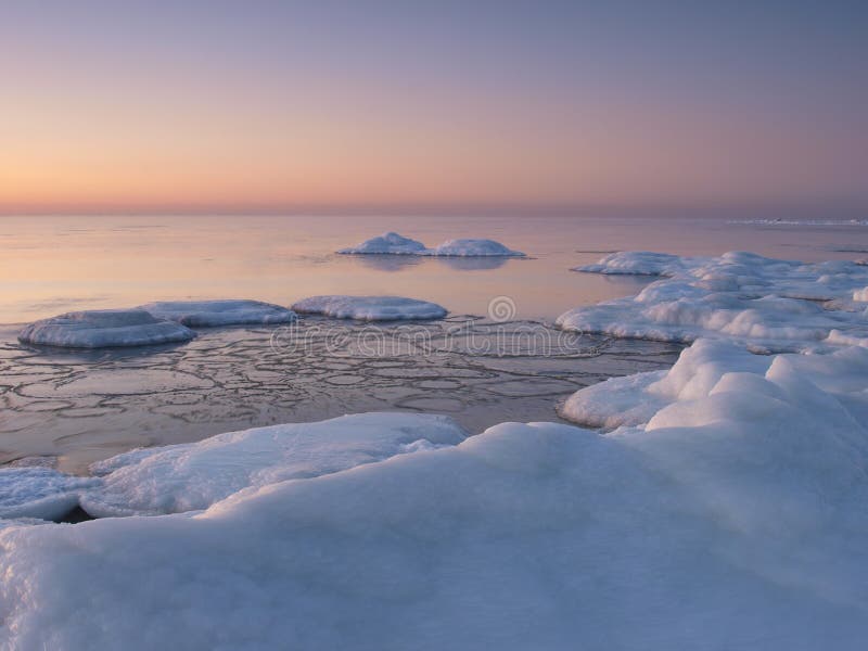 Freezing Sea Shore in the Romantic Evening Light Stock Photo - Image of ...