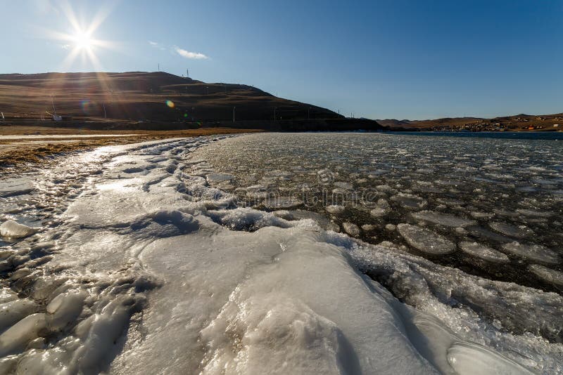 Freezing Waters of Baikal Lake with Floating Icicles Stock Photo ...