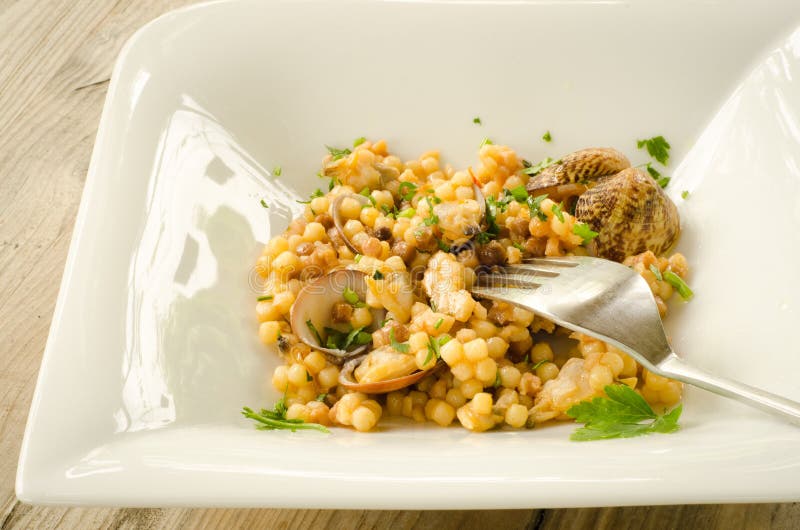 Fregola with clams stock image. Image of food, recipe - 25886673