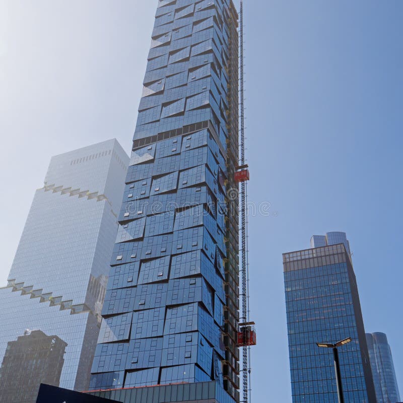 Freight Construction Elevator Ascends To Top of a Skyscraper. Temporary ...