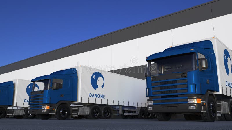 Freight Semi Trucks with Danone Logo Loading or Unloading at Warehouse ...
