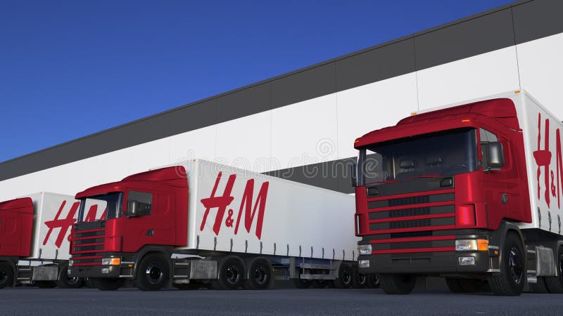 Freight Semi Trucks with H M Logo Loading or Unloading at Warehouse ...