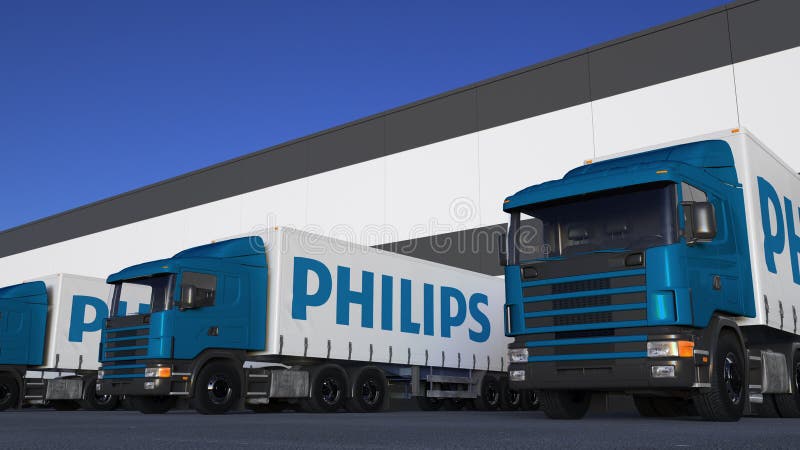 Freight Semi Trucks with Philips Logo Loading or Unloading at Warehouse ...