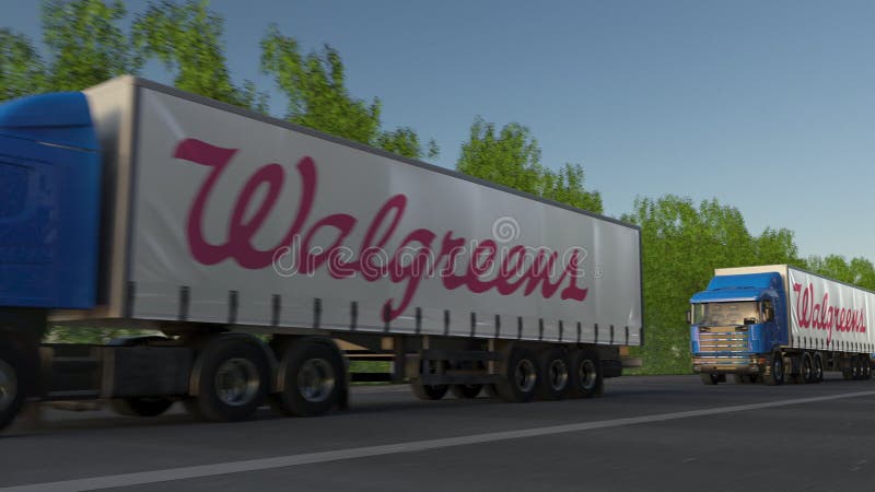 Freight Semi Trucks with Walgreens Logo Driving Along Forest Road ...
