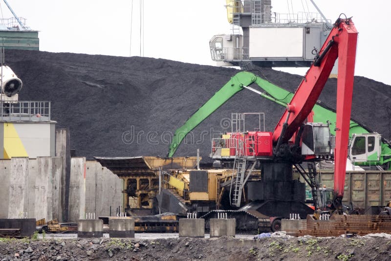 In Freight Terminal, Gantry Crane and Cargo Ships are in Loading and ...