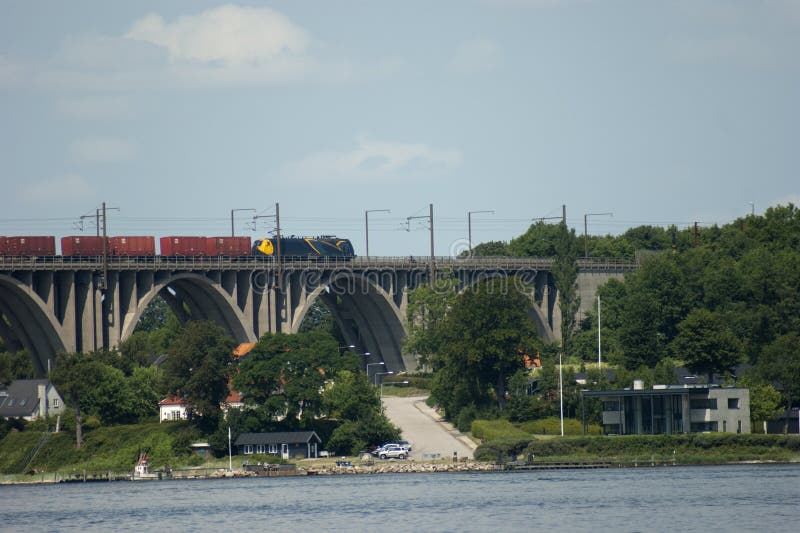 Freight train on a bridge stock image. Image of rail - 61661227