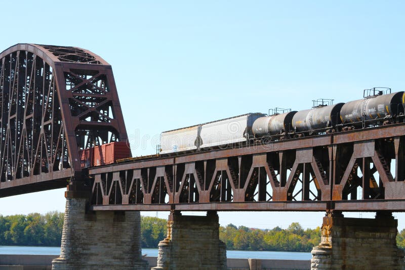 Freight Train Crossing a Steel Railroad Truss River Bridge Editorial ...