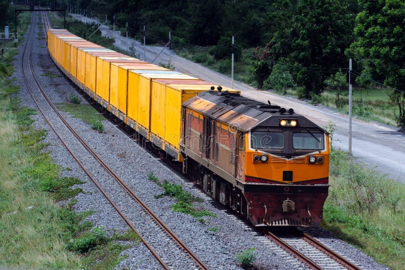 Freight Train by Diesel Locomotive on the Railway Stock Photo - Image ...