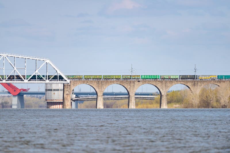 Freight Train Rides Over the Bridge Stock Image - Image of industrial ...
