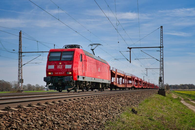 Freight Train with Empty Car Transport Wagons through Dedensen Guemmer ...