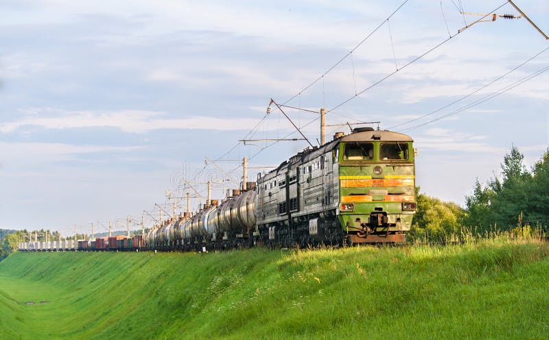 Freight Train Hauled by Diesel Locomotive Stock Image - Image of ...