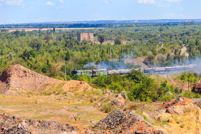 Freight Train in Iron Ore Quarry Stock Photo - Image of equipment, rail ...