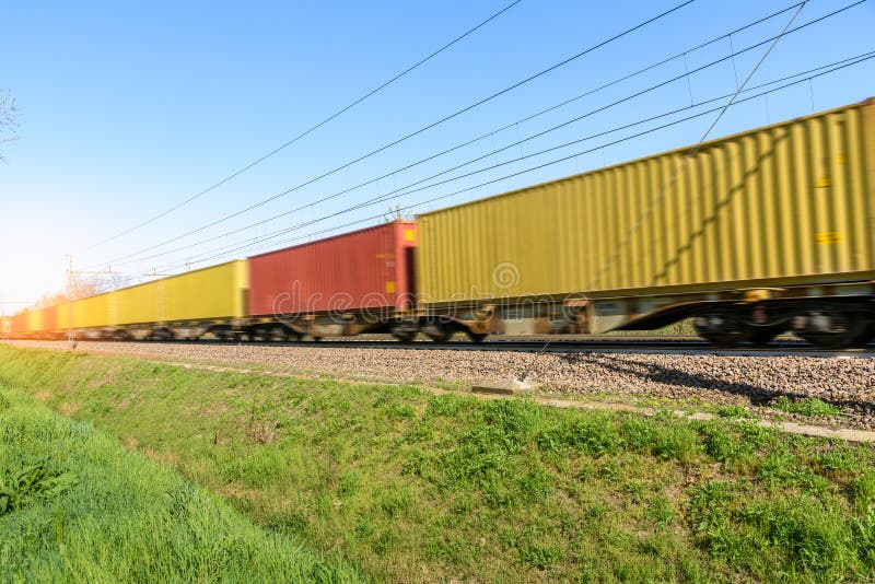 Freight Train in Motion on Clear Spring Day Stock Photo - Image of ...