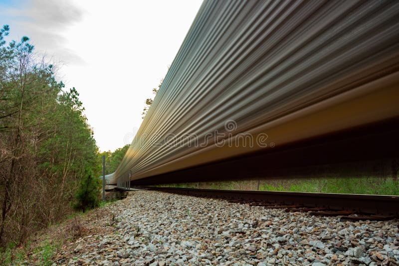 Freight Train Moving Fast on Rail Road Tracks Stock Photo - Image of ...