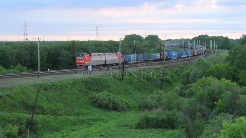 Freight Train Passing on a Railroad Track in the Countryside Stock ...