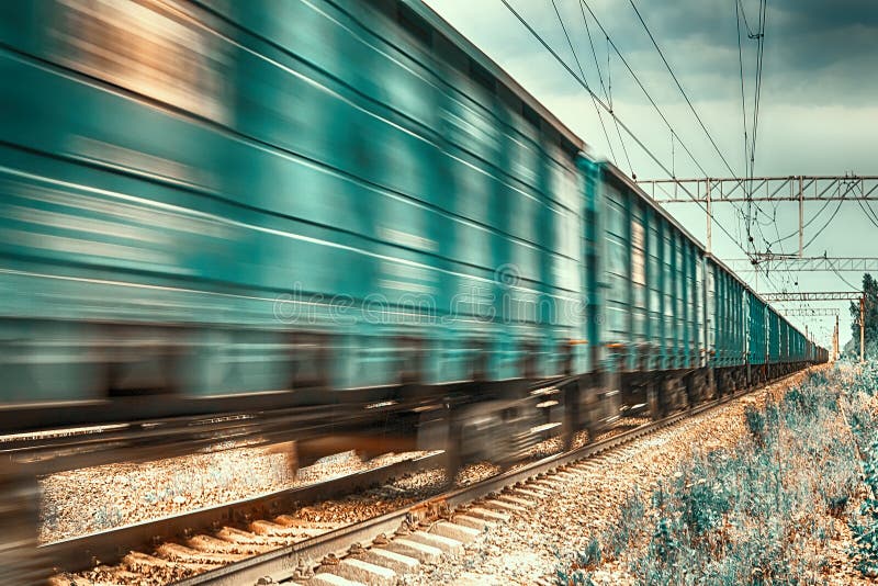 Freight Train Rushes with Motion Blur. Toned. Stock Image - Image of ...