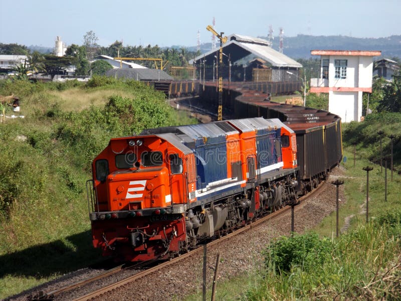 Freight Train with Red Locomotive in Coal Loading Station Editorial ...
