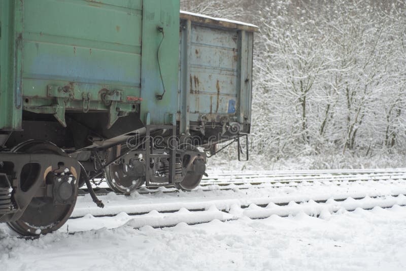 A Freight Train Stands at a Stop in the Winter Forest. Stock Photo ...