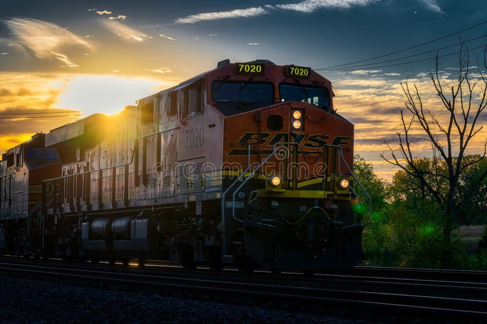 Freight Train at Sunset with Dramatic Lighting. Editorial Stock Image - Image of journey, engine ...