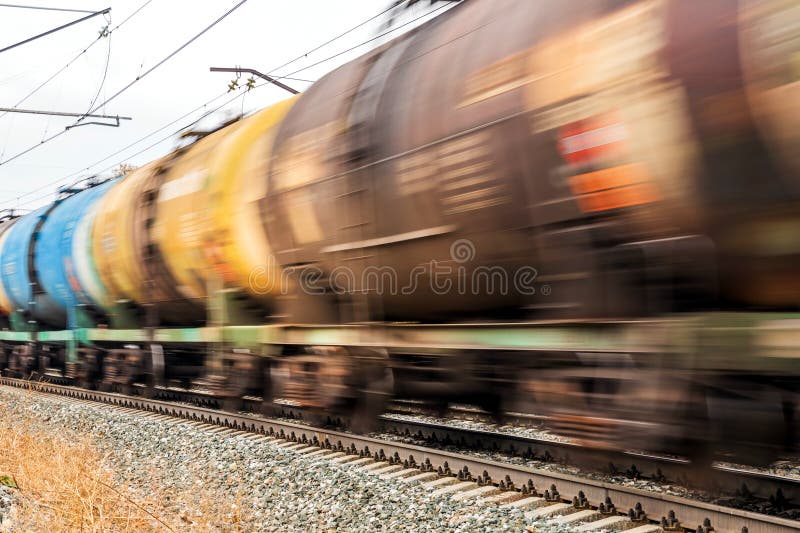 A Freight Train of Tanks Rushing Stock Photo - Image of tanks ...