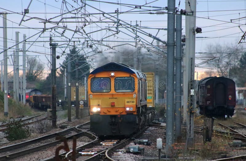 Freight Trains and Steam Train, WCML, Carnforth Editorial Image - Image ...