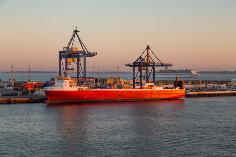 Freighter and Cruise Ship in Harbor Editorial Photography - Image of ...