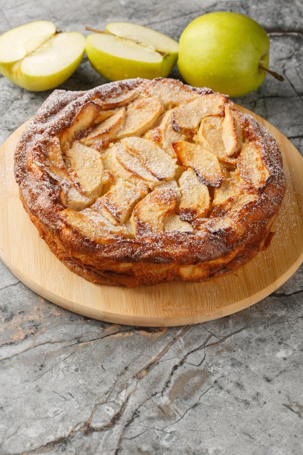 French Apple Clafoutis Pie with Praline Close-up. Vertical Stock Photo ...