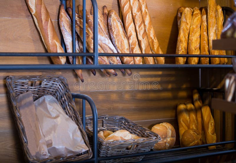 French Baguettes in Shelves of Bakery Stock Image - Image of shelves ...