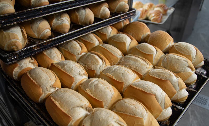 French Bread in Production Inside the Bakery Stock Photo - Image of ...