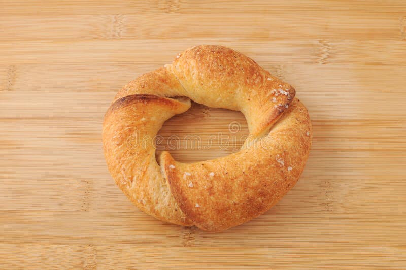 French Bread Shaped Circle on Cutting Board Stock Photo - Image of ...