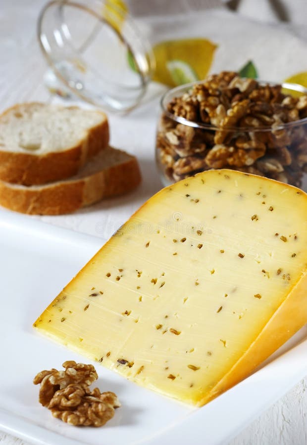 French cheese with cumin stock image. Image of collation - 42534981
