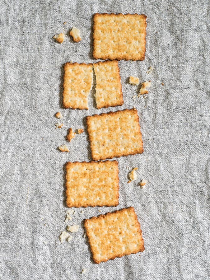 French Cracker with Sesame Seeds on a Gray Tissue Background Stock ...