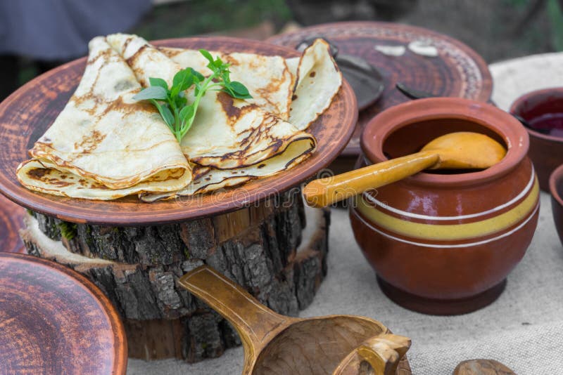 French Crepes on Ceramic Platter. Table Setting in National Traditions ...