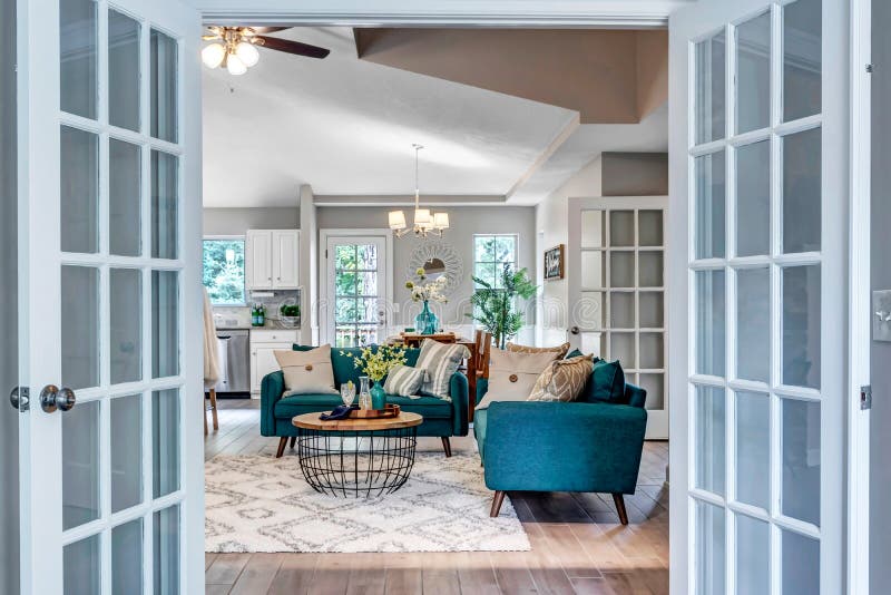 French Doors Looking To Cozy Living Room Stock Photo - Image of ...