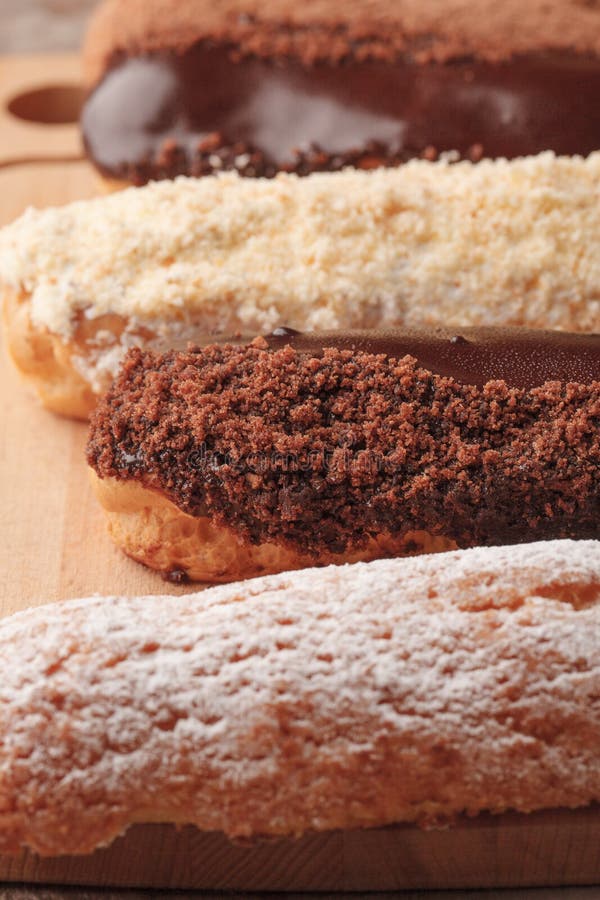 French Eclairs. Chocolate and Cream Eclairs for Coffee Stock Image ...