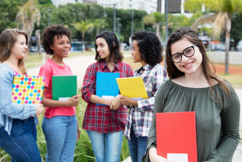 French Female Student with Group of International Students Stock Photo ...