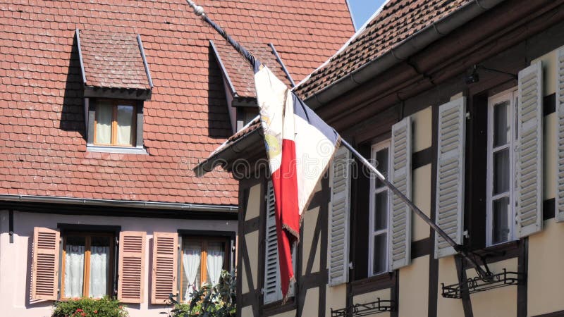 A French Flag is Hanging from a Building Stock Video - Video of ...