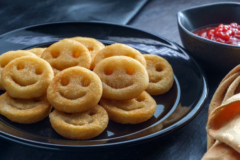 French Fried Potato Smiles stock photo. Image of food - 165573218