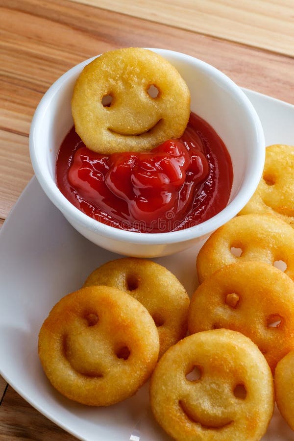 French Fried Potato Smiles stock photo. Image of fattening - 165573290