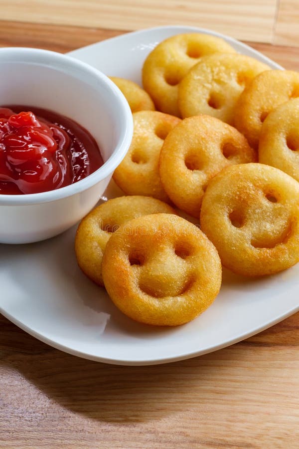 French Fried Potato Smiles stock photo. Image of fattening - 165573290