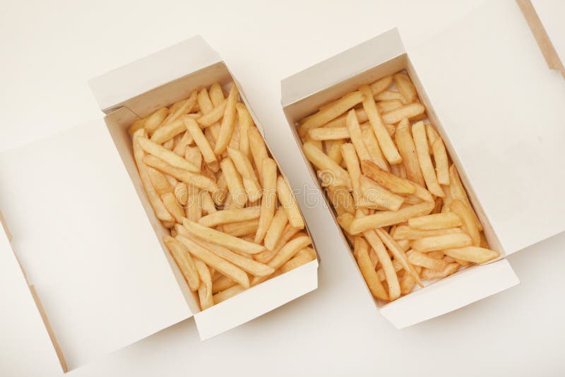 French Fries on a Cardboard Box. Fried Potatoes in a Package Stock ...