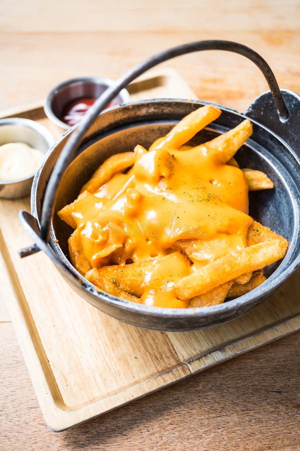 French Fries with Cheese on Top Stock Photo - Image of yellow, melted ...