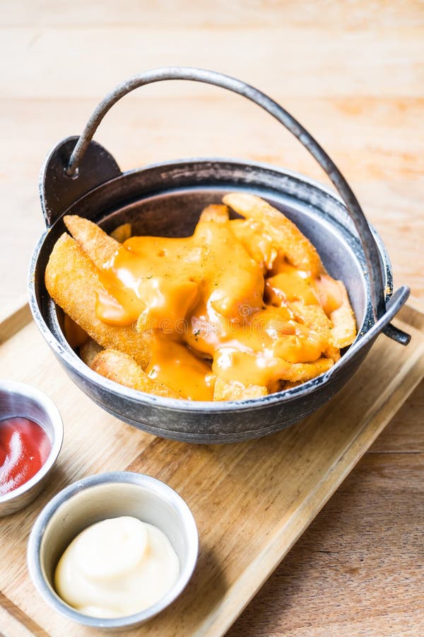 French Fries with Cheese on Top Stock Photo - Image of spring, meal ...