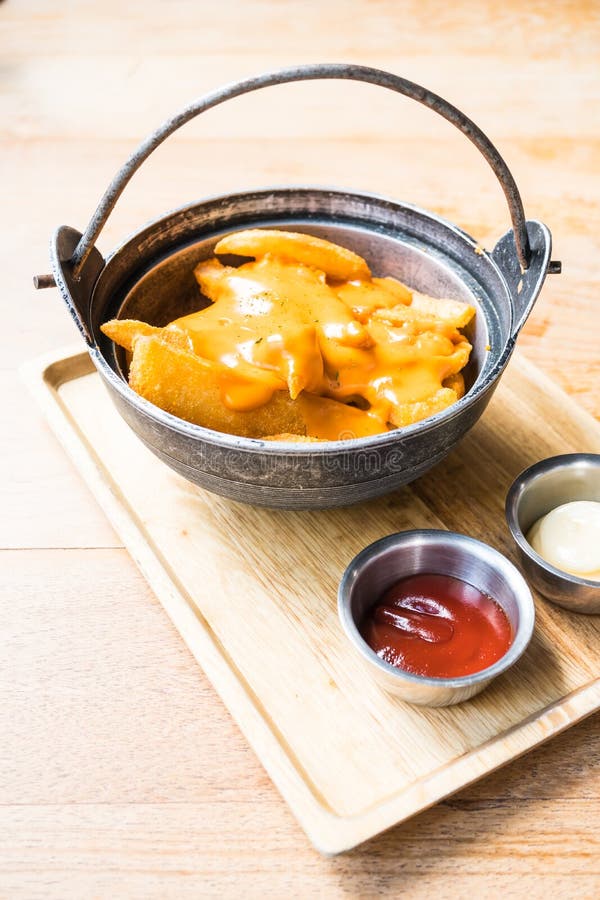 French Fries with Cheese on Top Stock Photo - Image of golden, diet ...