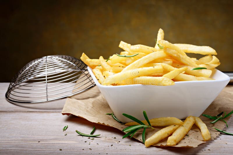 French Fries, Chips and Colander in Rustic Setting. Stock Image - Image ...