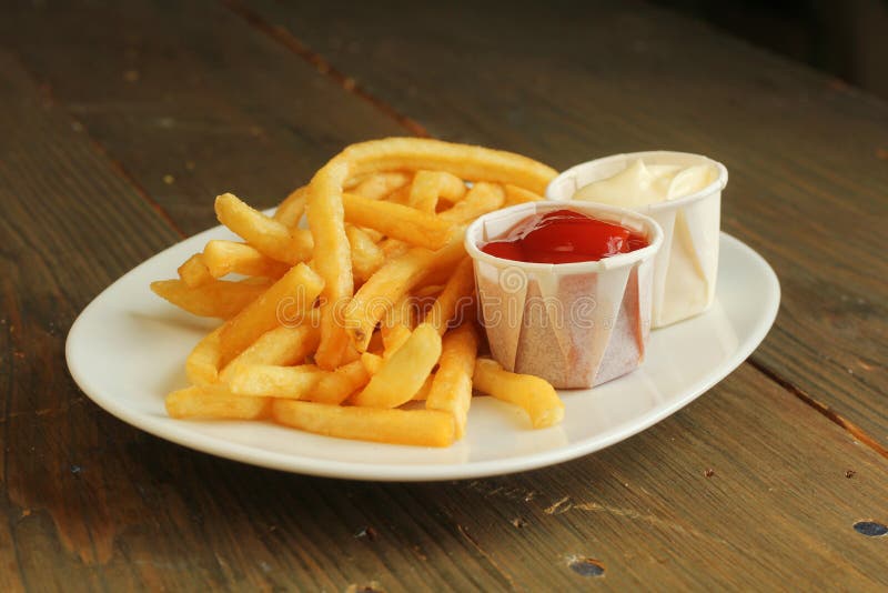 French Fries with Condiment Stock Photo - Image of napkins, tasty: 27788572