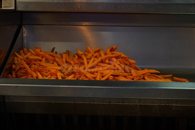 French Fries in Deep Fryer at Restaurant Kitchen Stock Photo - Image of ...